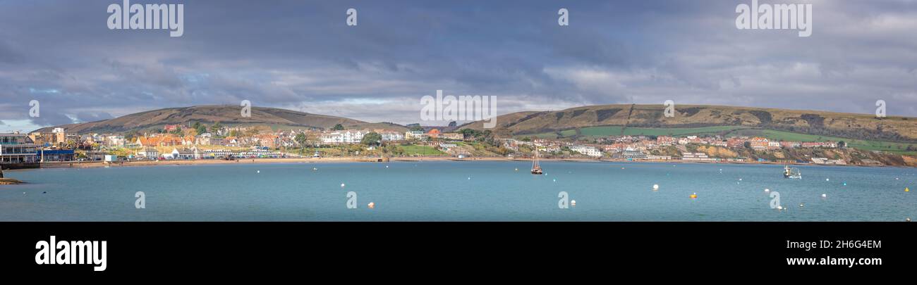 Panorama of Swanage Bay and cliffs behand in Swanage, Dorset, UK on 13 ...