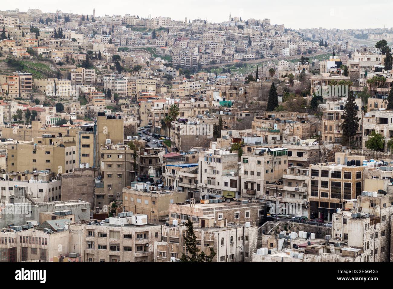 Skyline of Amman with houses on steep slopes, Jordan Stock Photo - Alamy