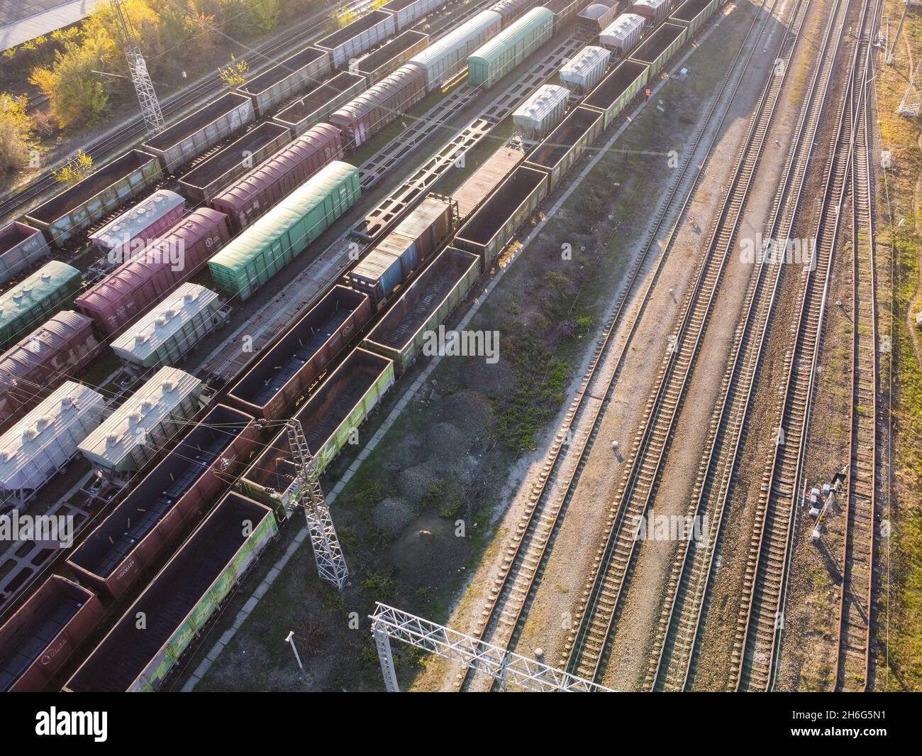Freight train cars on railway siding Stock Photo - Alamy