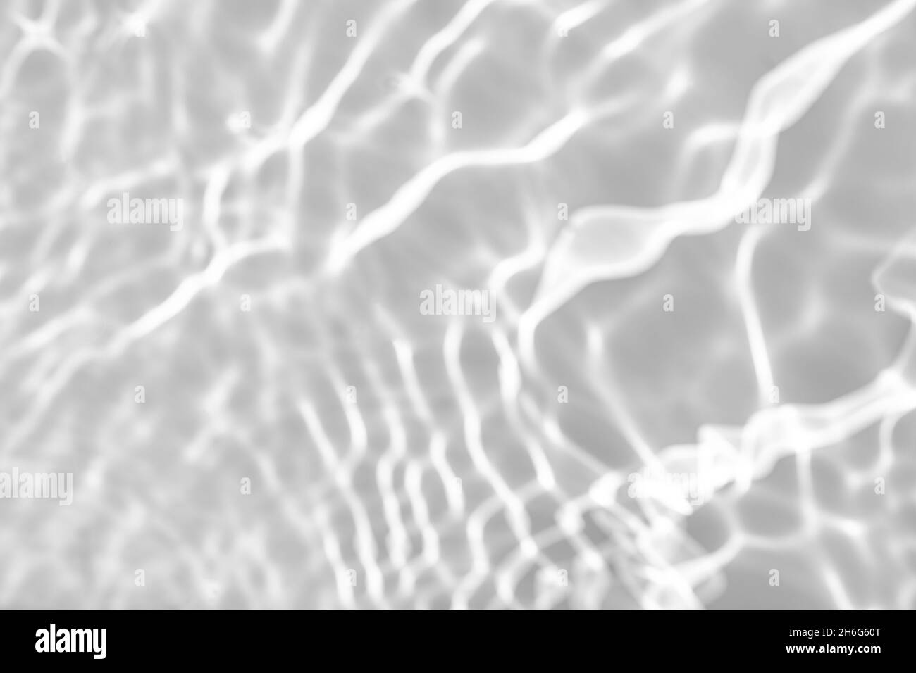 blurred shadow and light caustic effect on a white wall Stock Photo - Alamy