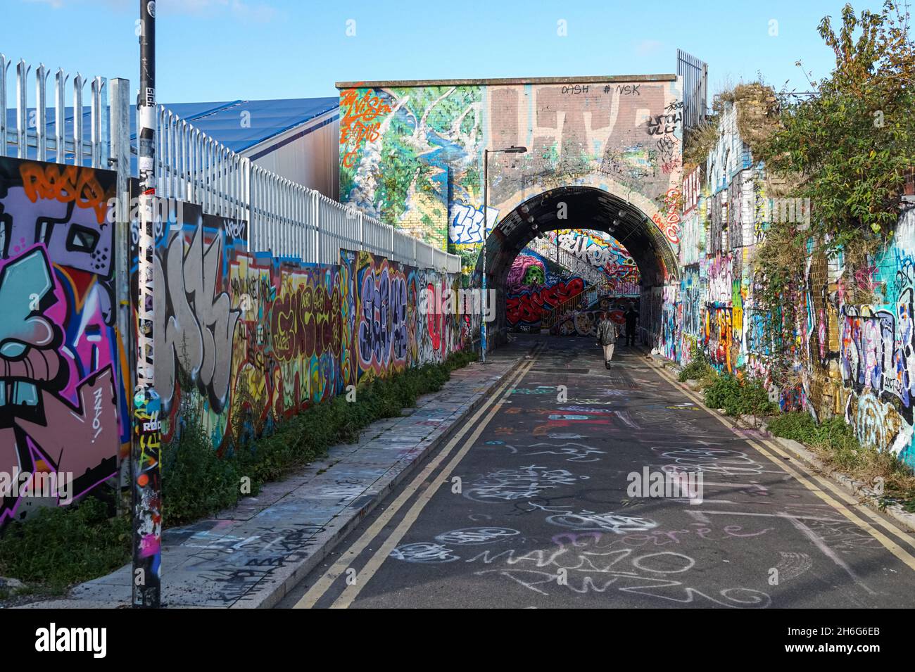 Graffiti covering old railway arch on Fleet Street Hill in Shoreditch ...