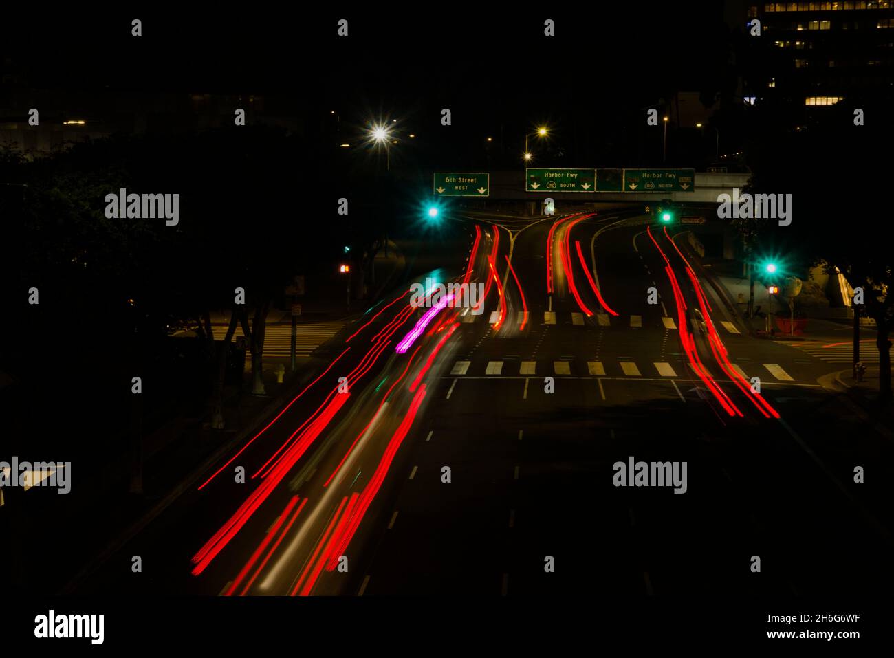 Traffic patterns of LA fast lane in fast city. Red line lights of ...