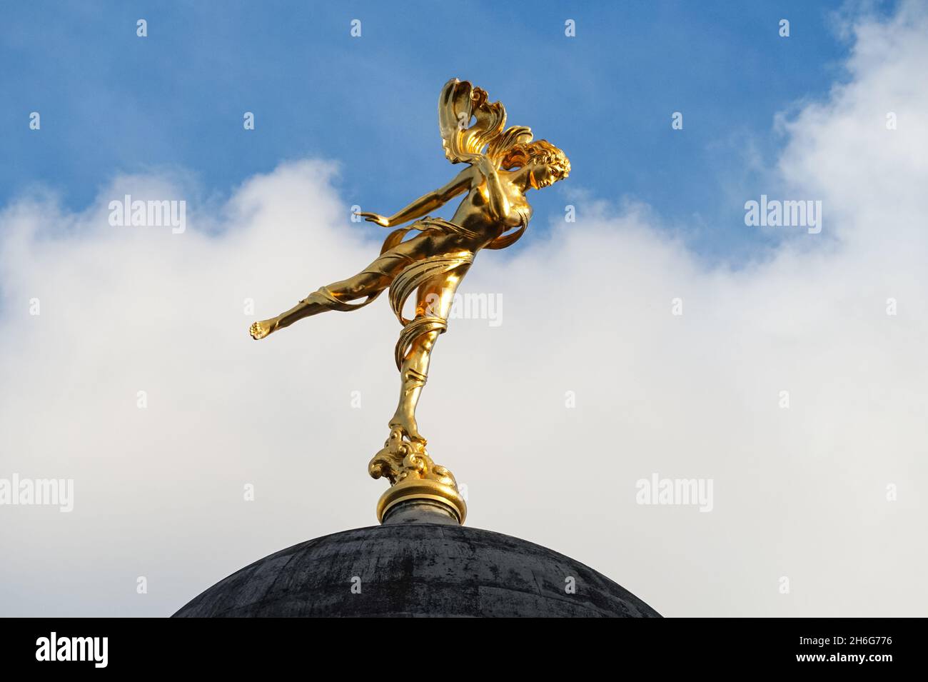 Golden statue of Shakespeare's Ariel on a dome of the Bank of England ...