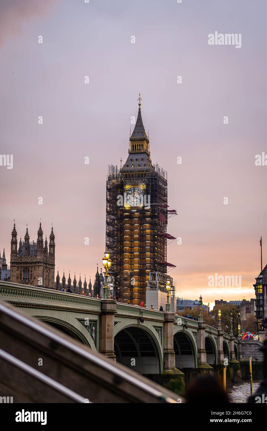 Looking at Elizabeth Tower covered in scaffolding. London Stock Photo ...