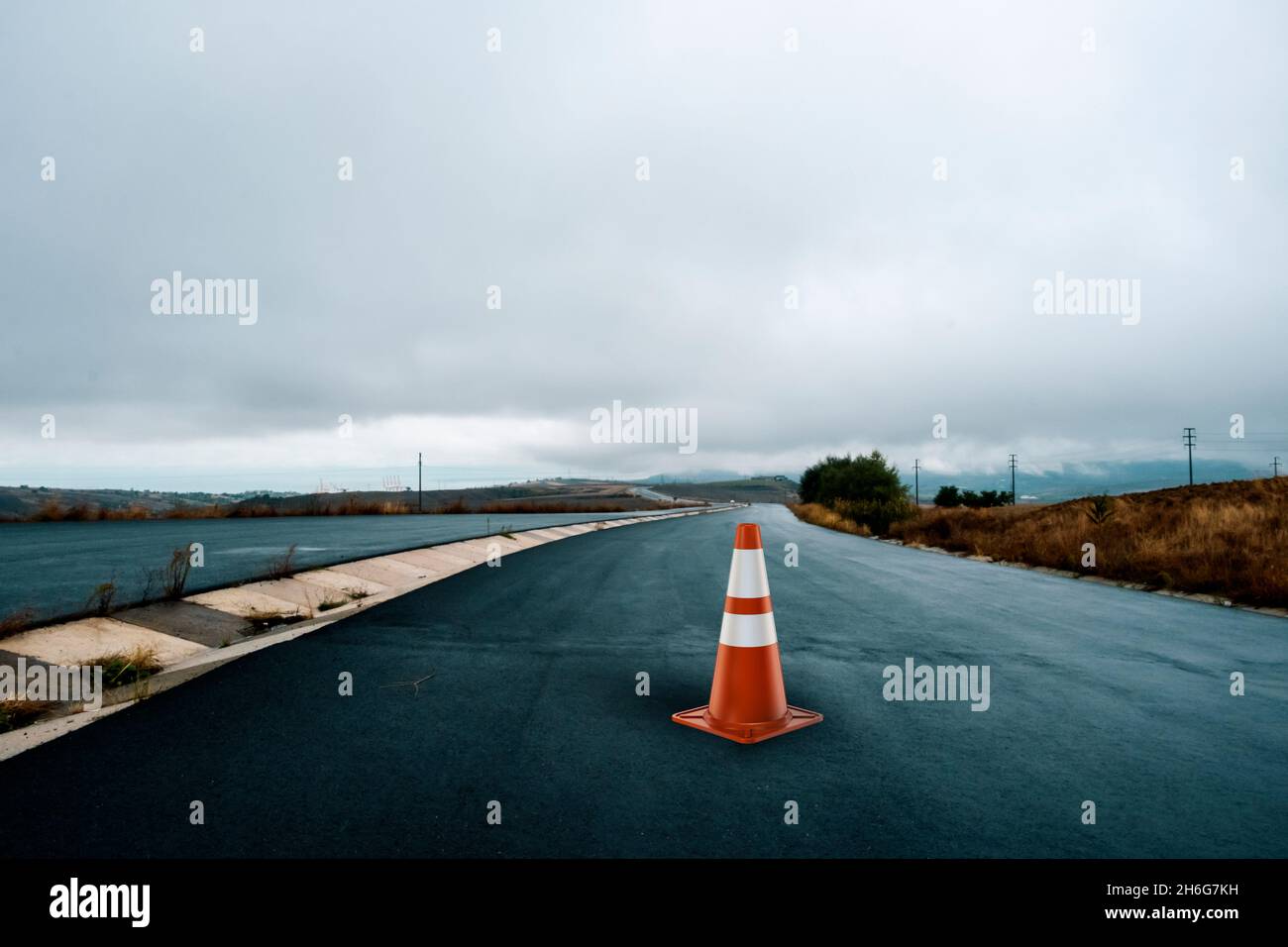 plastic road sign on empty highway road Stock Photo - Alamy