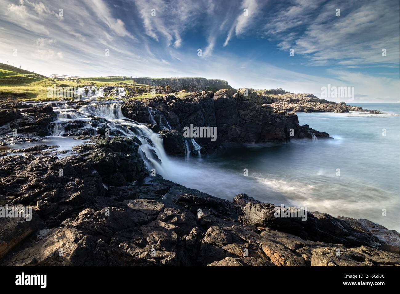 Dunseverick waterfalls on the Antrim coast near the Giant's Causeway ...