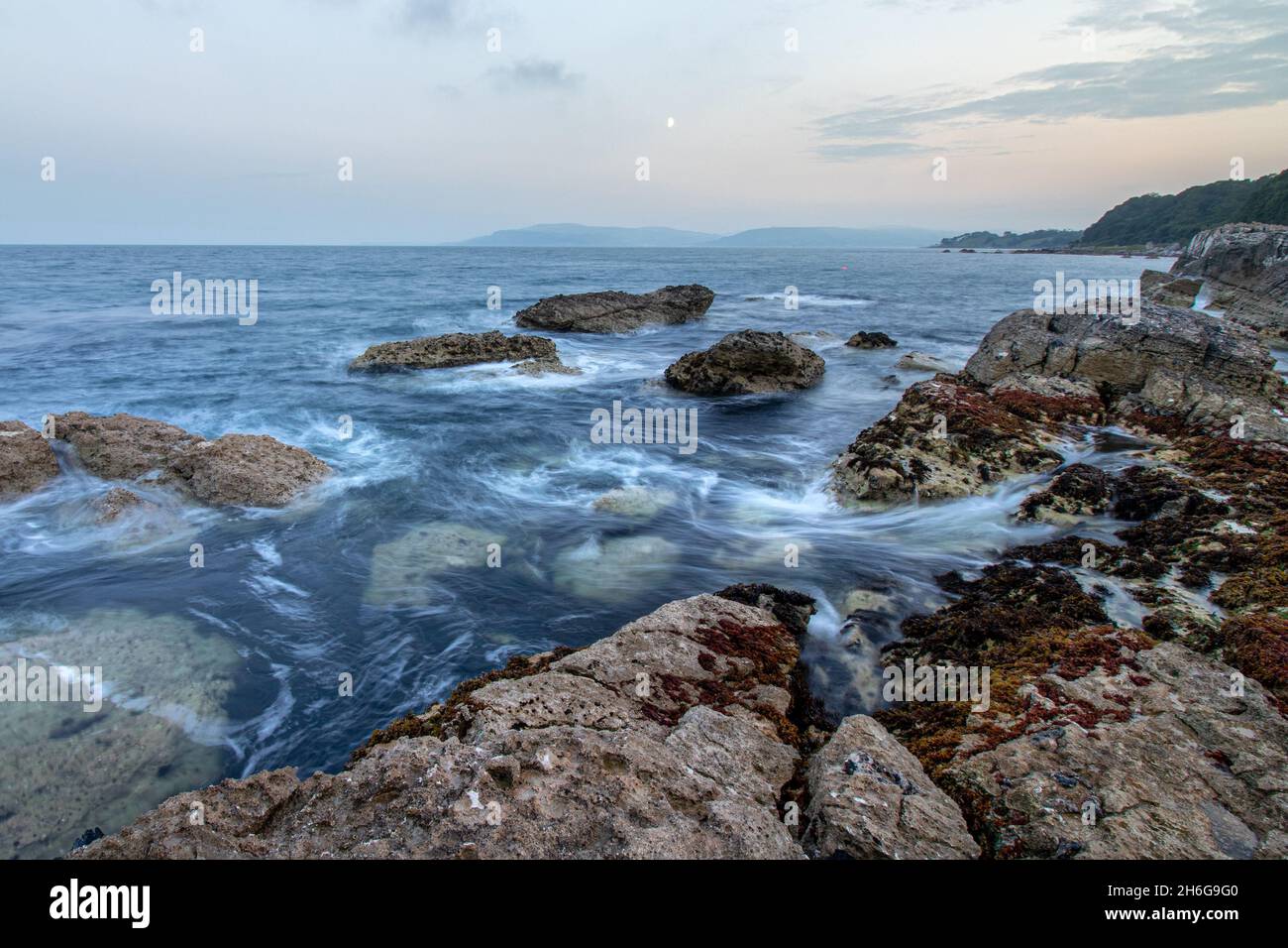 Garron Point on the Antrim Coast Road by moonlight Stock Photo - Alamy