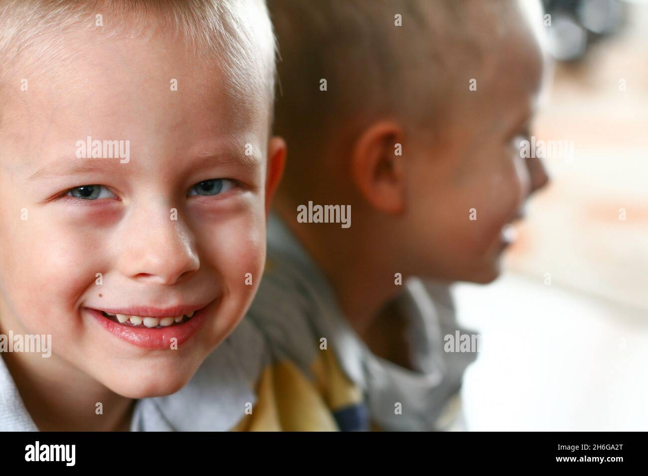 Boy looking straight at you with innocent eyes hi-res stock photography ...