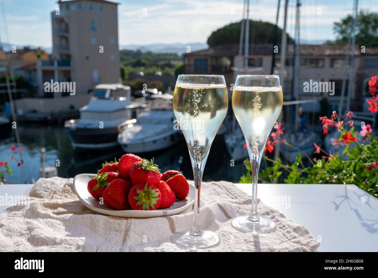 Summer party, drinking of French brut champagne sparkling wine in ...