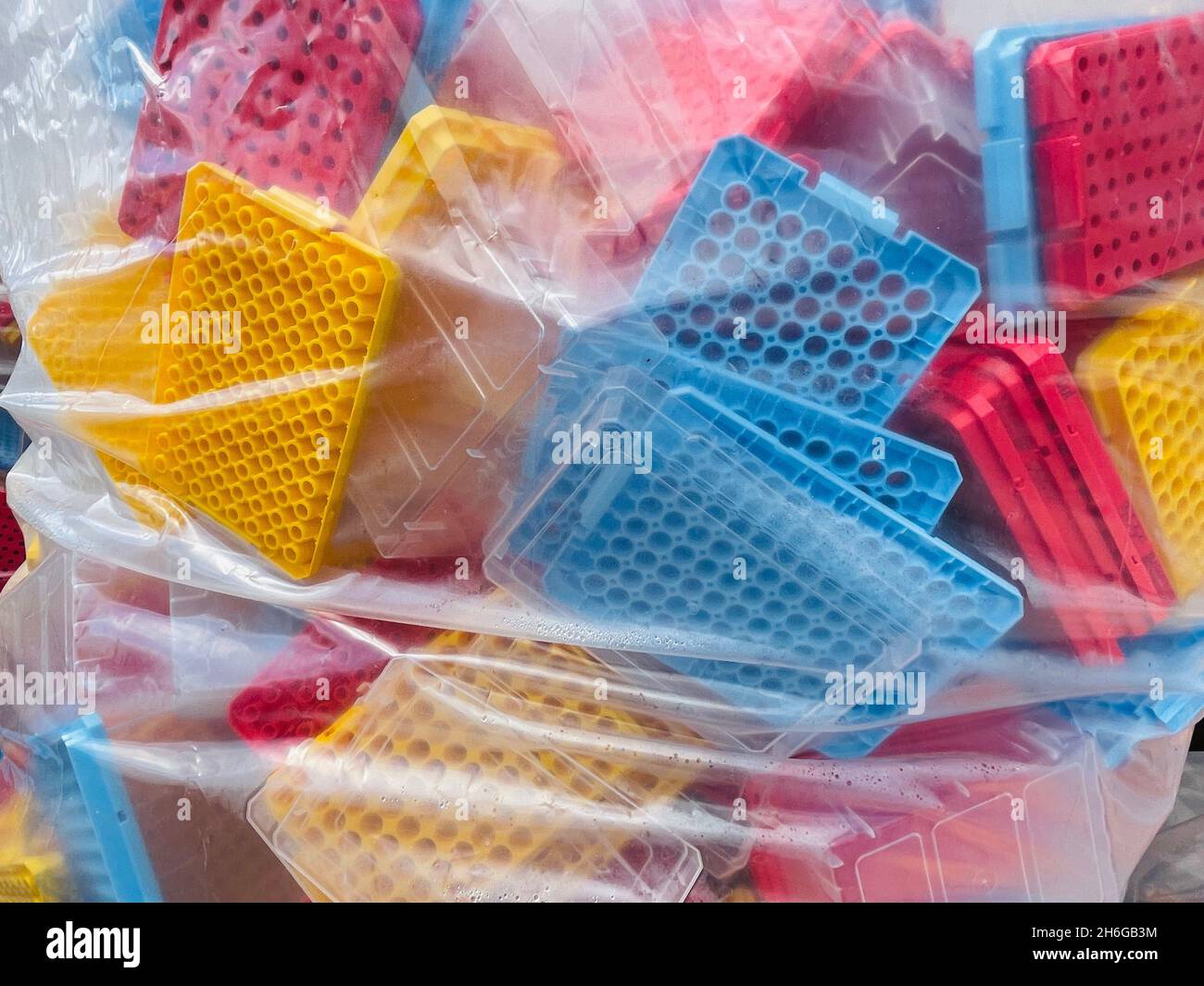 Red, yellow and blue polypropylene plastic wastes Stock Photo - Alamy