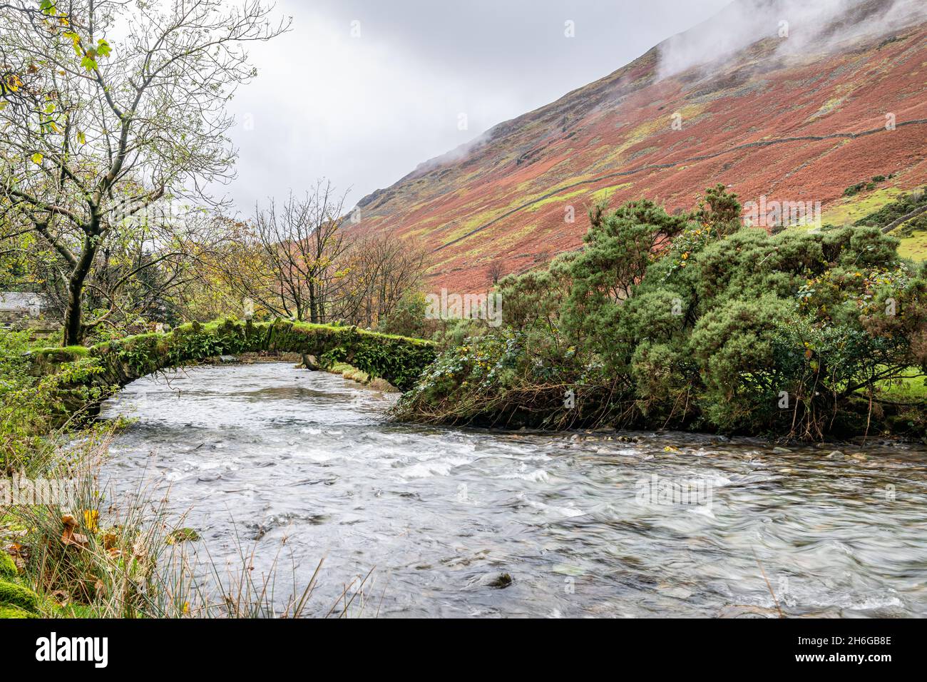 Footbridge over Mosedale Beck at Wasdale Head in the Lake District in ...
