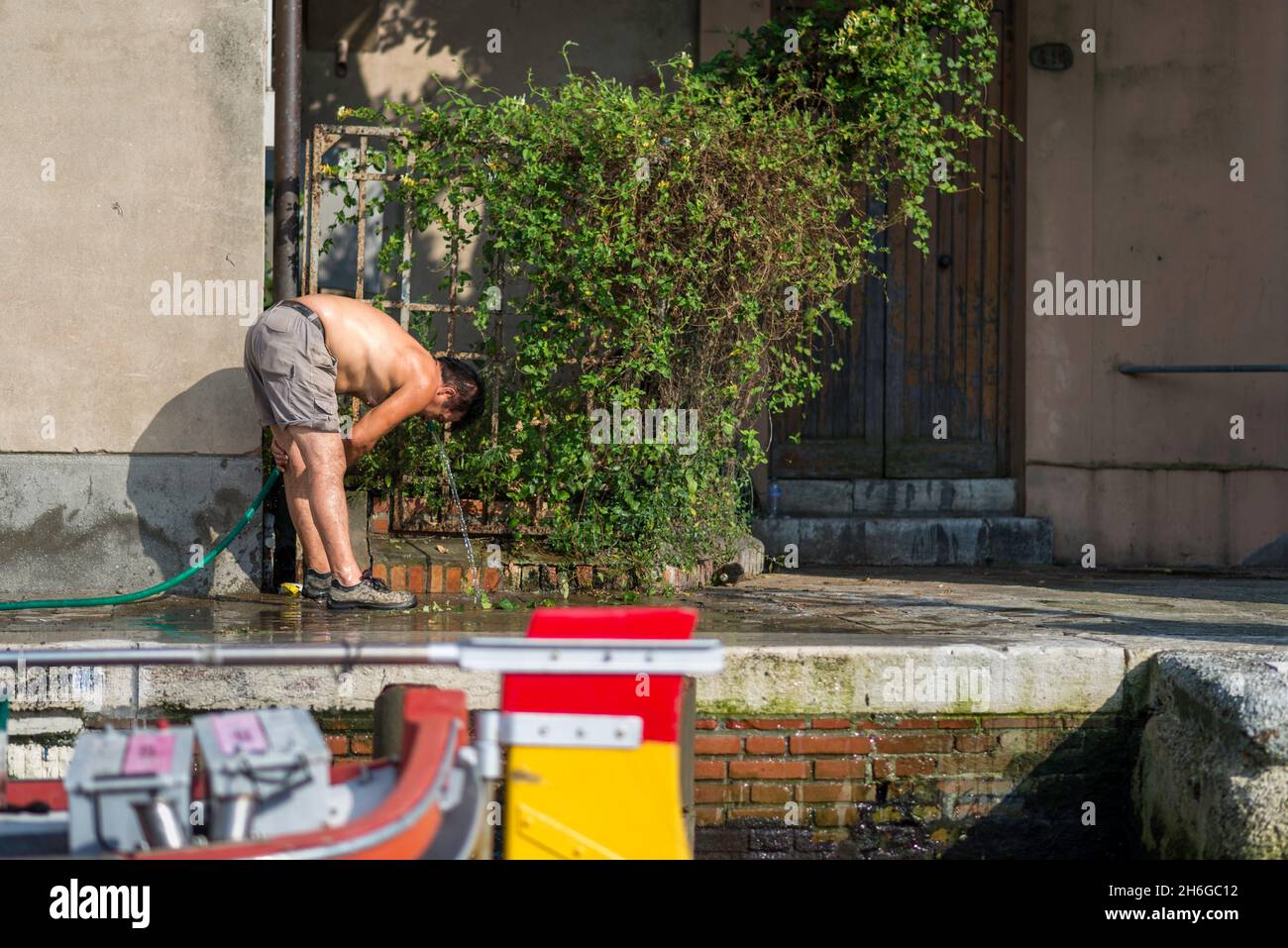 Drinking from hose pipe hi-res stock photography and images - Alamy