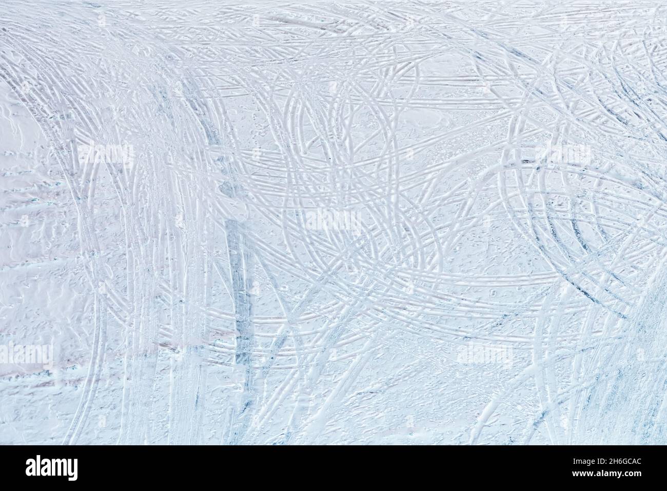 Ice rink texture. Traces of skates on ice of skating-rink, top view ...