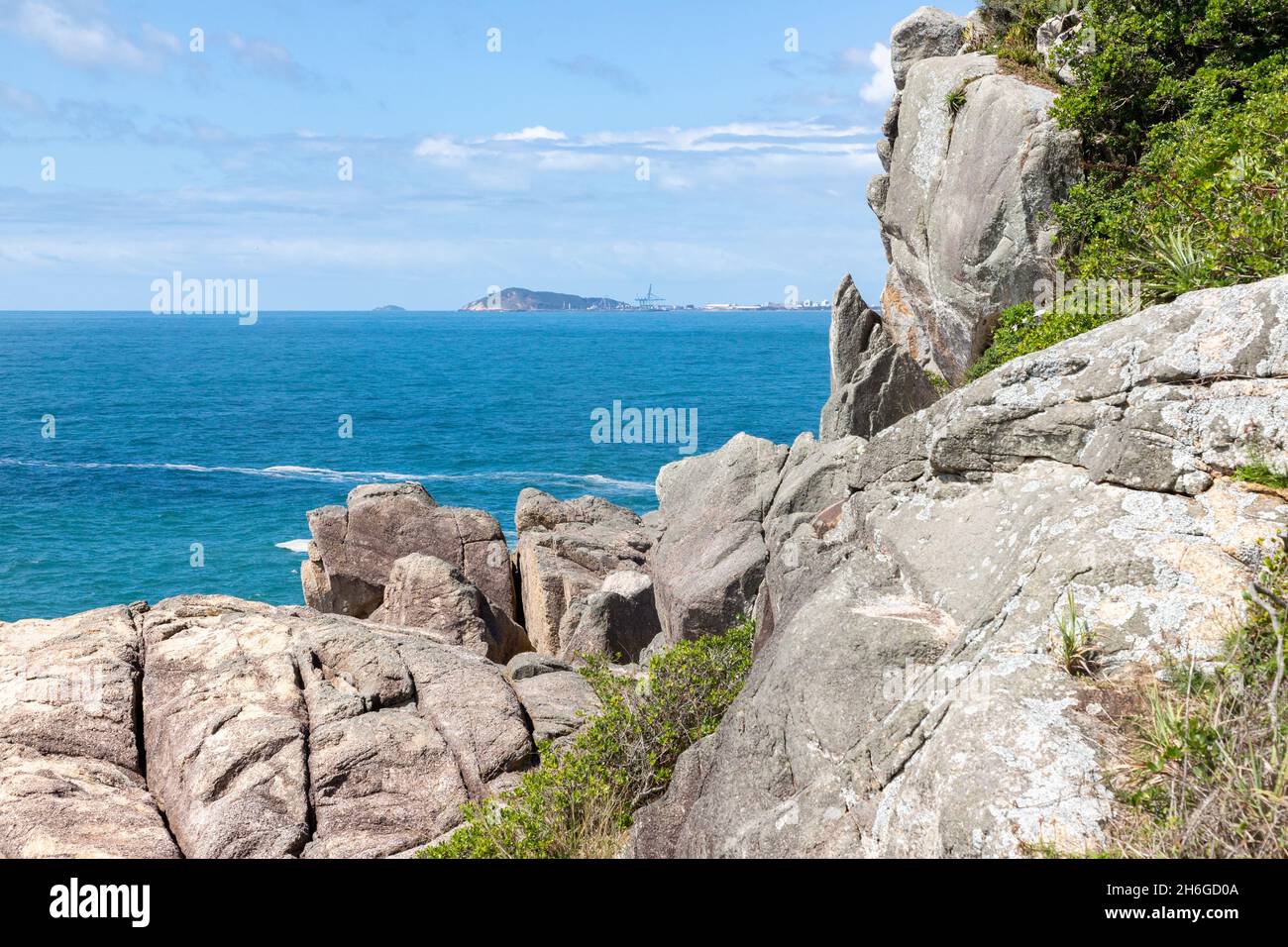 Rocks on cliffs and ocean in background, Praia do Rosa, Ibiraquera ...