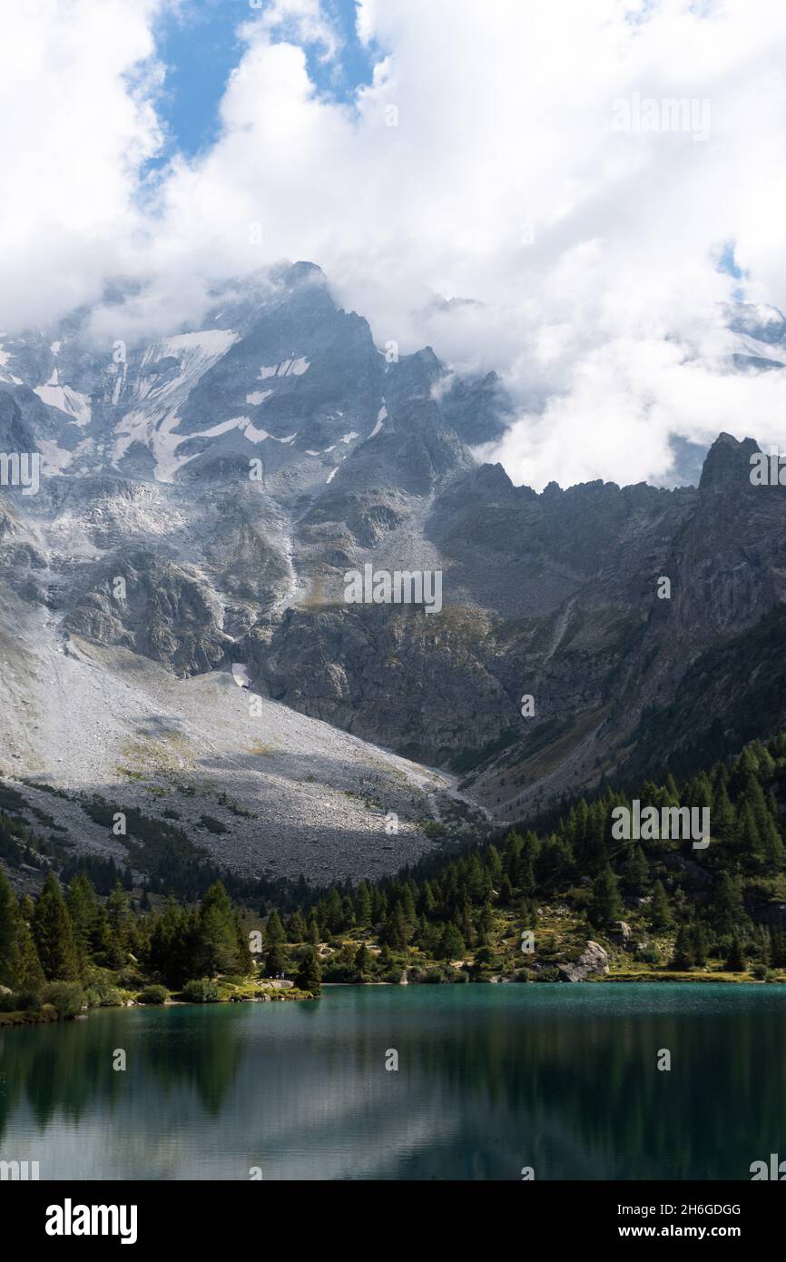 sitting by Aviolo Lake, in the North of Italy Stock Photo - Alamy
