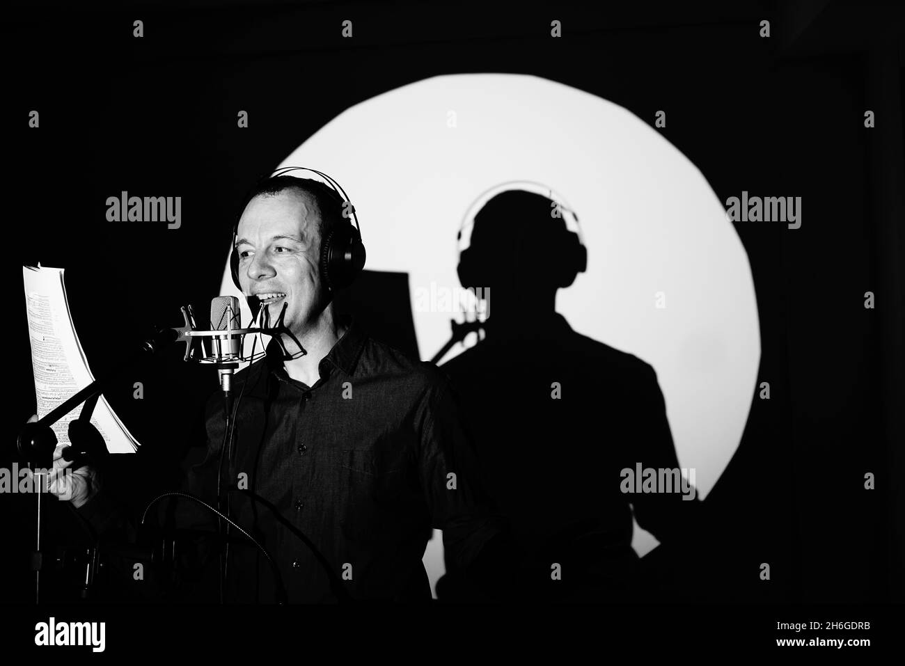 Male singer singing in studio microphone in music album cover design ...