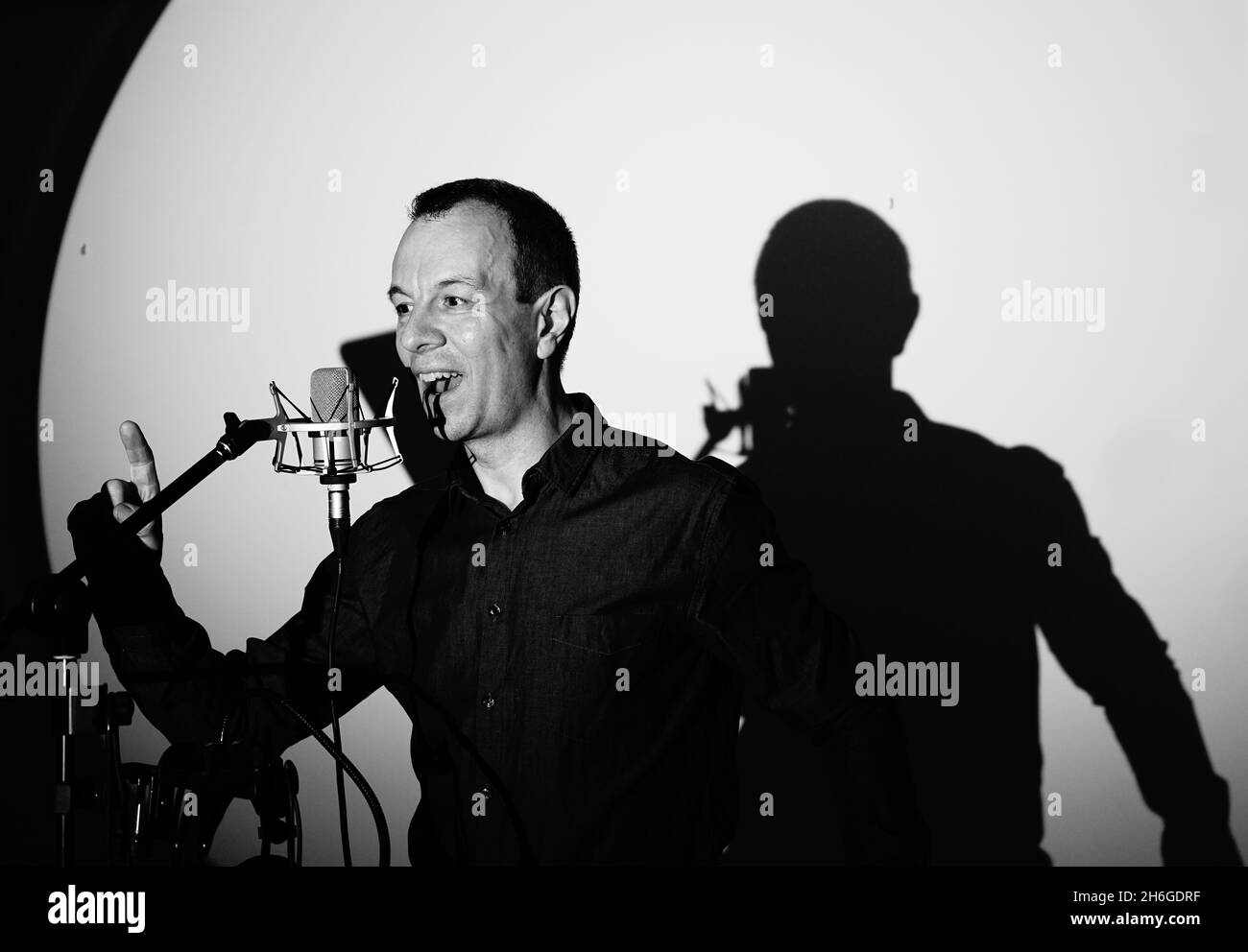 Male singer singing in studio microphone in music album cover design ...