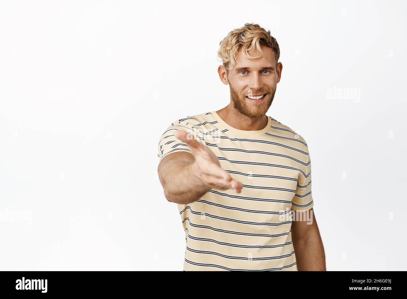 Business man extending hand hi-res stock photography and images - Alamy