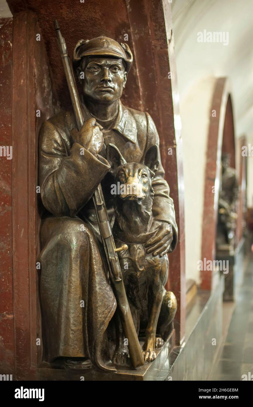 Statue at Ploshchad Revolyutsii metro station in Moscow Russia Stock ...