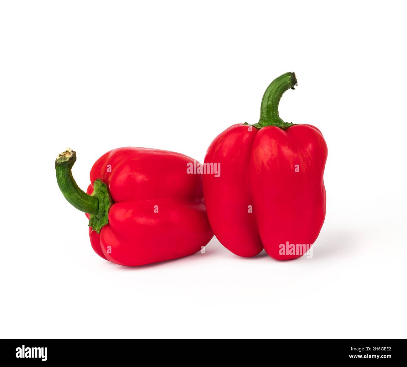 two red ripe peppers red on a white background with a shadow Stock ...