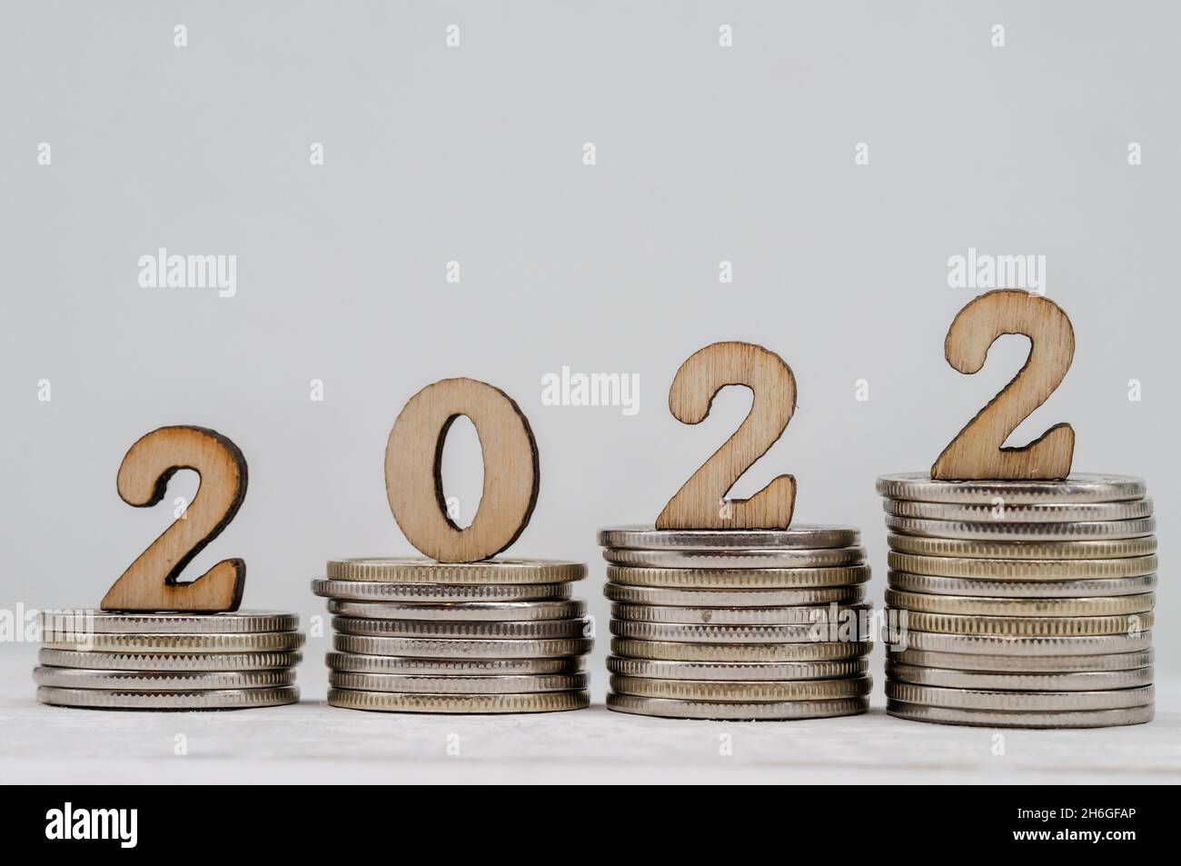 Coins and Figures 2022. Banner 2022. Money stacked in columns Stock ...