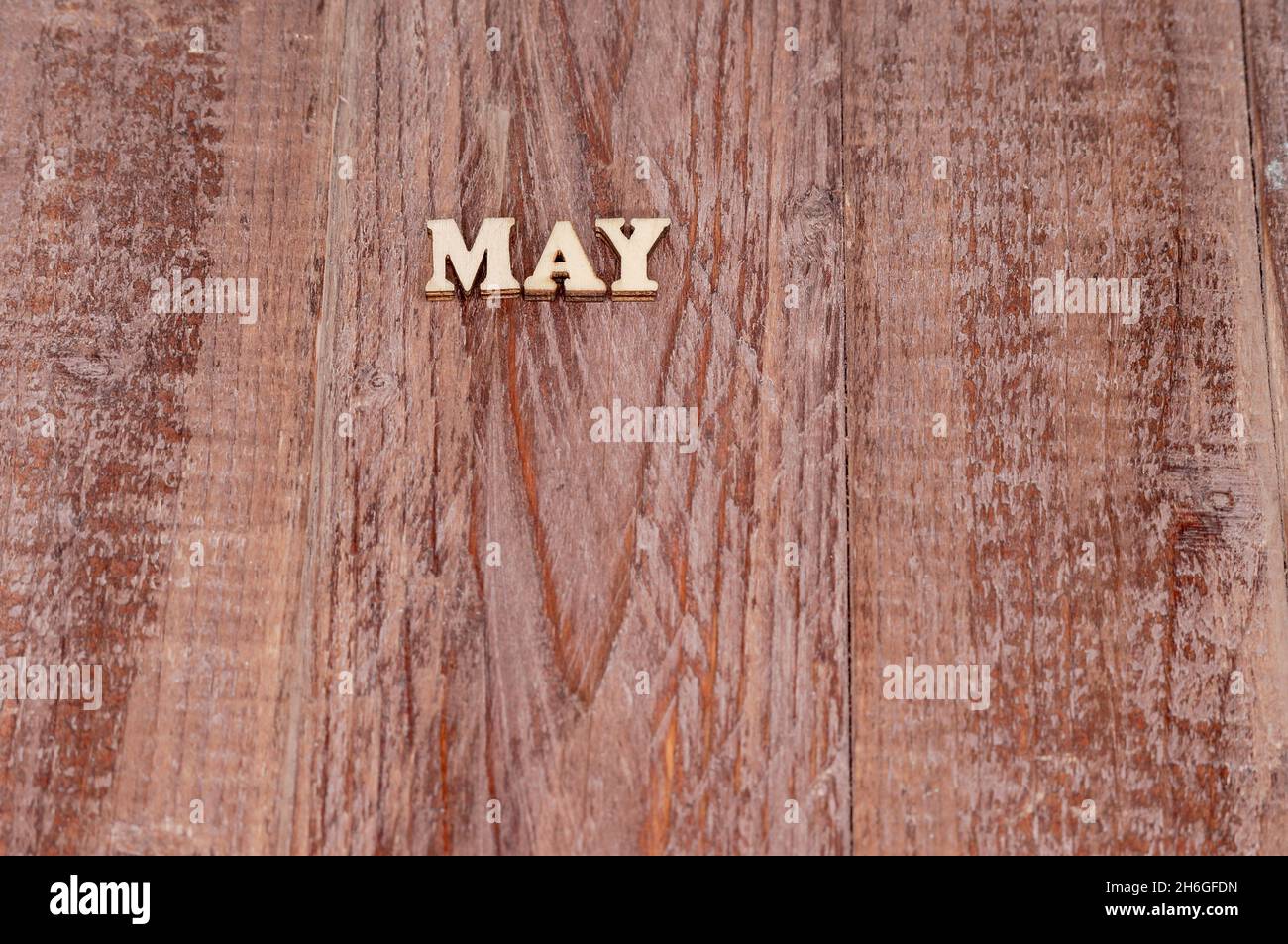 May month. Template for a calendar. The name of the months on a wooden ...