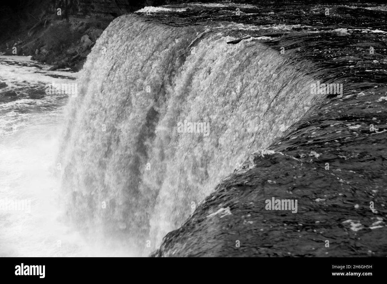 Grayscale natural landscape shot of a waterfall Stock Photo - Alamy