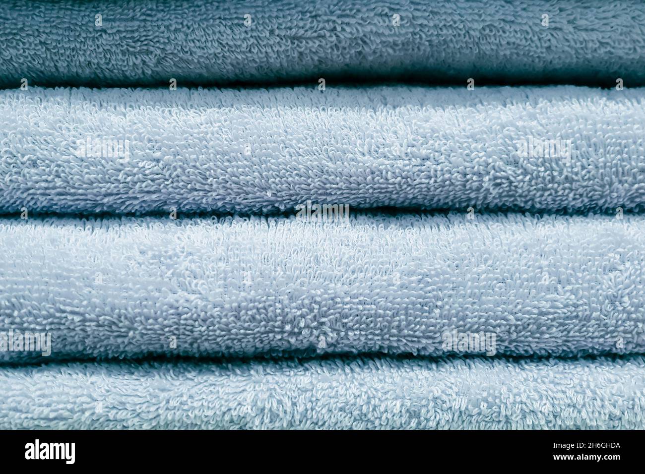 Stack of bath towels. Home textiles for spa treatments. Soft fluffy ...