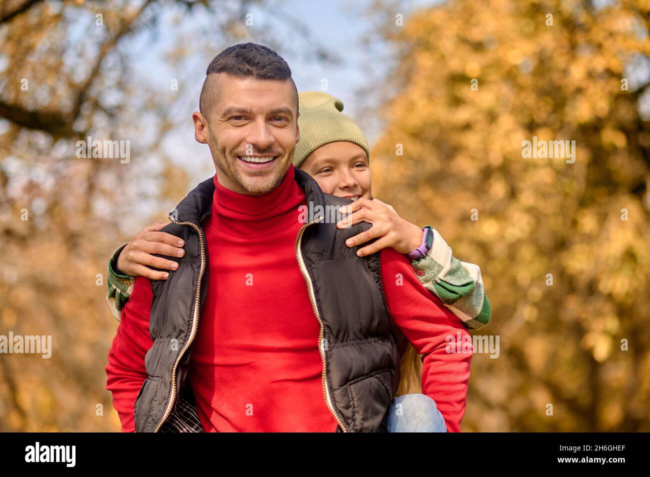 Dad and daughter playing in the park and looking happy Stock Photo - Alamy