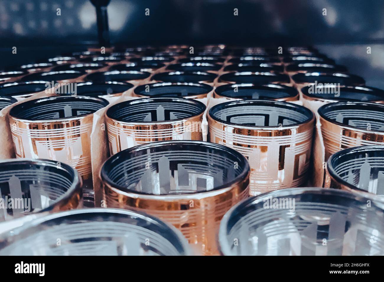 Lots of clear glass goblets. Glassware production. Empty glasses with ...