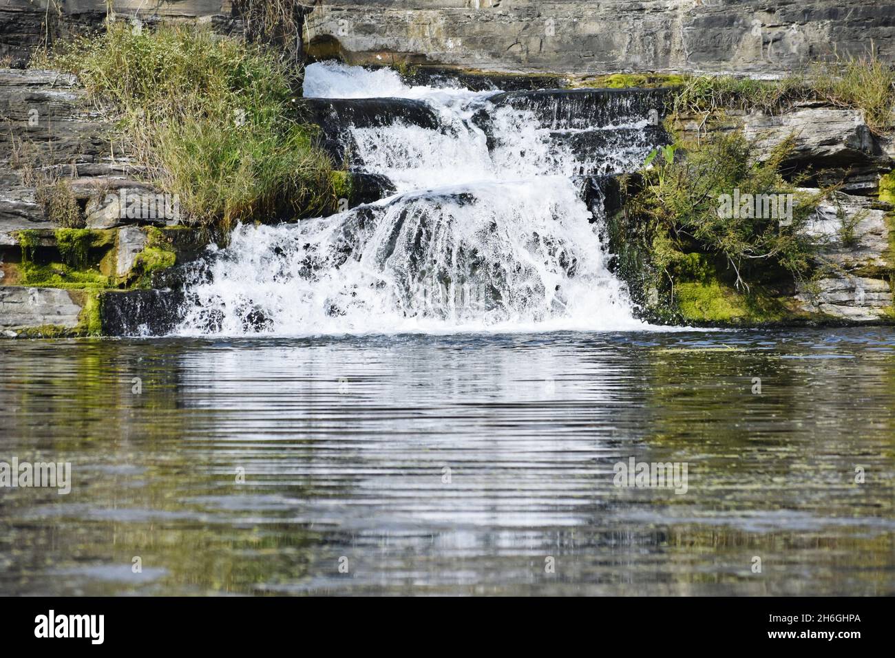Waterfall and river in the forest in spring Stock Photo - Alamy