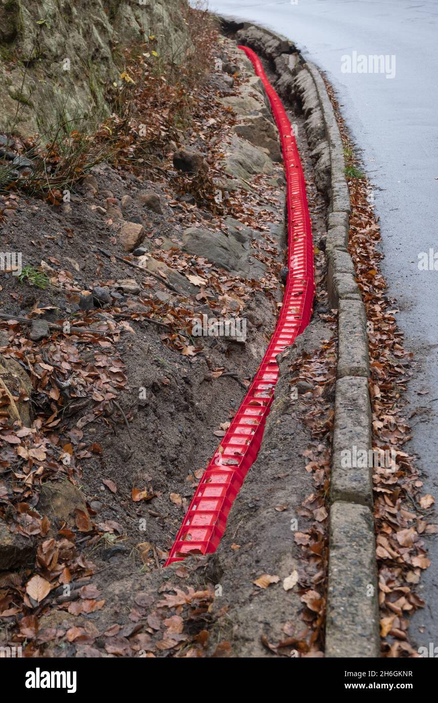 Communication Cables covered by red plastic flexible tube, Network ...
