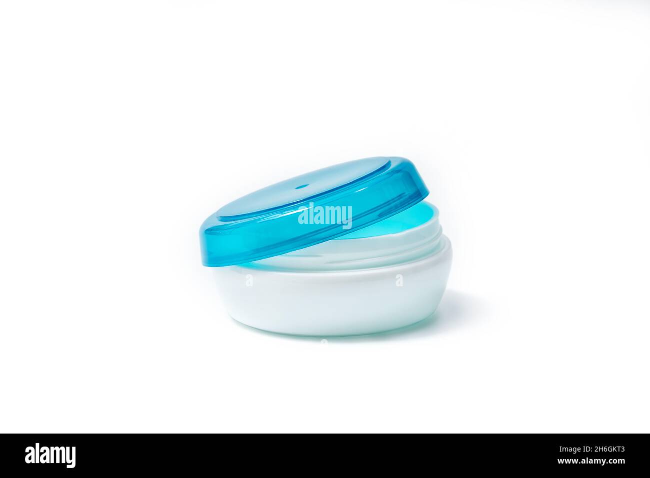 Empty White Plastic opaque cream jar with blue translucent lid ...