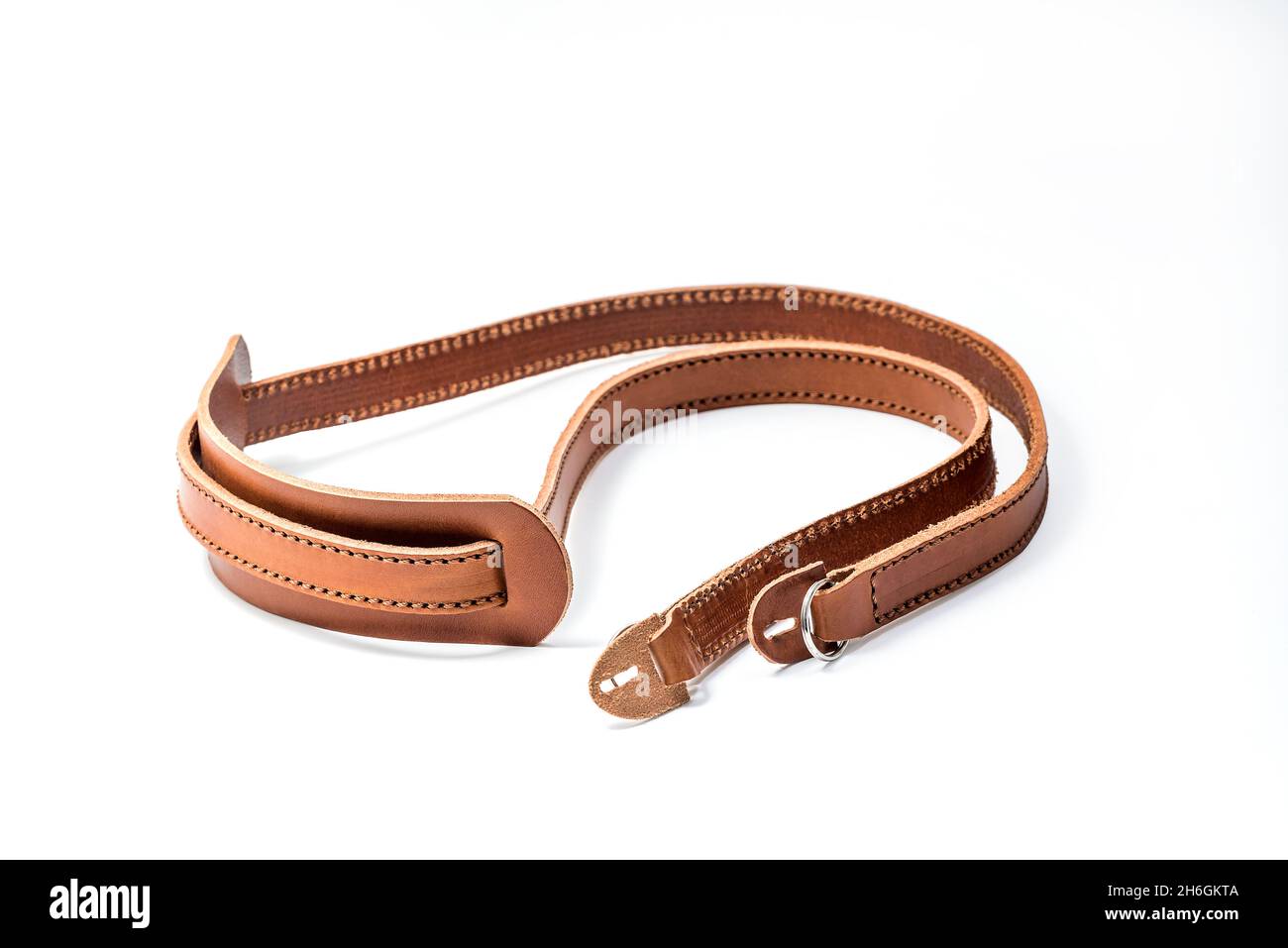 Brown leather camera strap isolated on white background. Isolated with ...