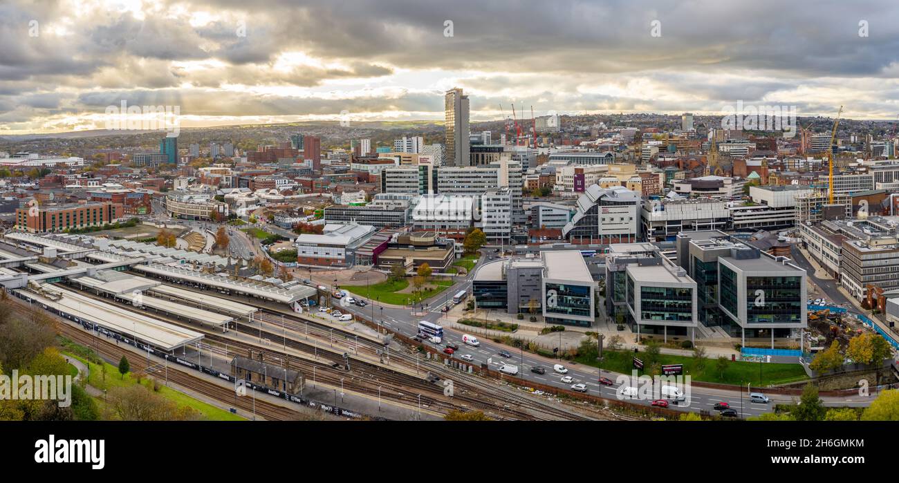 An aerial panorama view of Sheffield city centre and train station at ...
