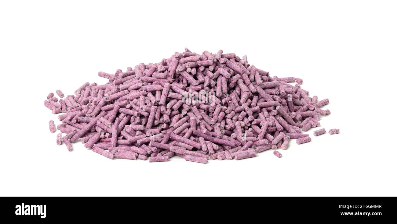 pile of pressed purple cat litter isolated on white background ...