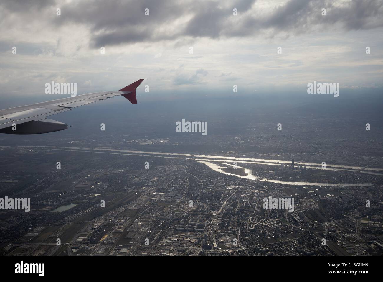 vienna from a window of an airplane with views of the danube. concept ...