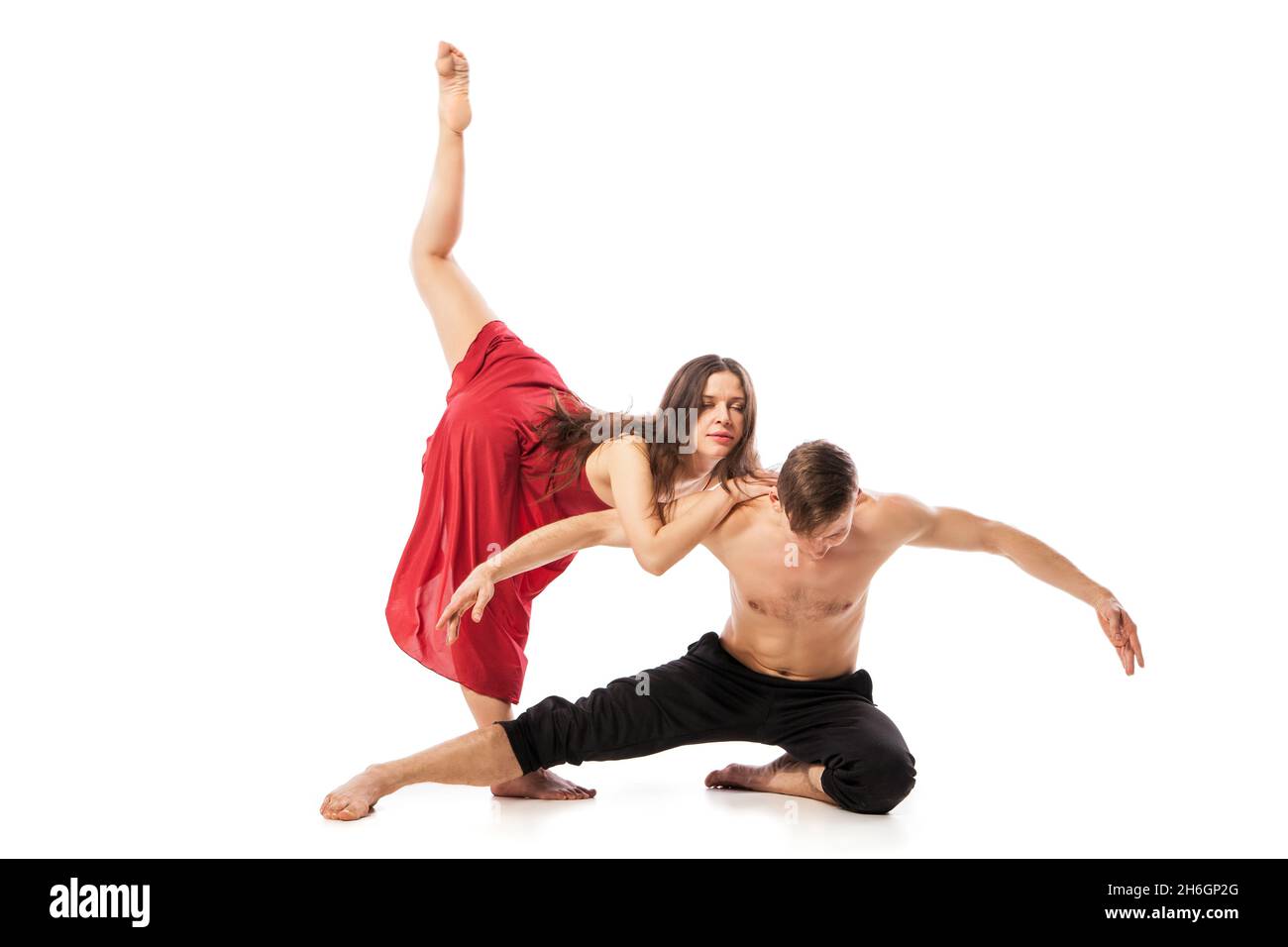 Couple of ballet dancers posing isolated over white background Stock ...