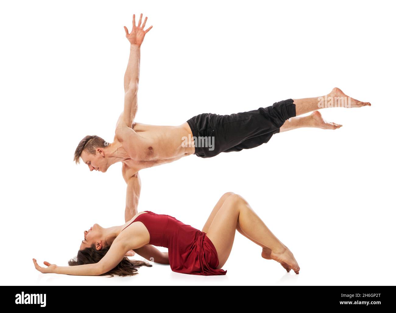 Couple of ballet dancers posing isolated over white background Stock ...