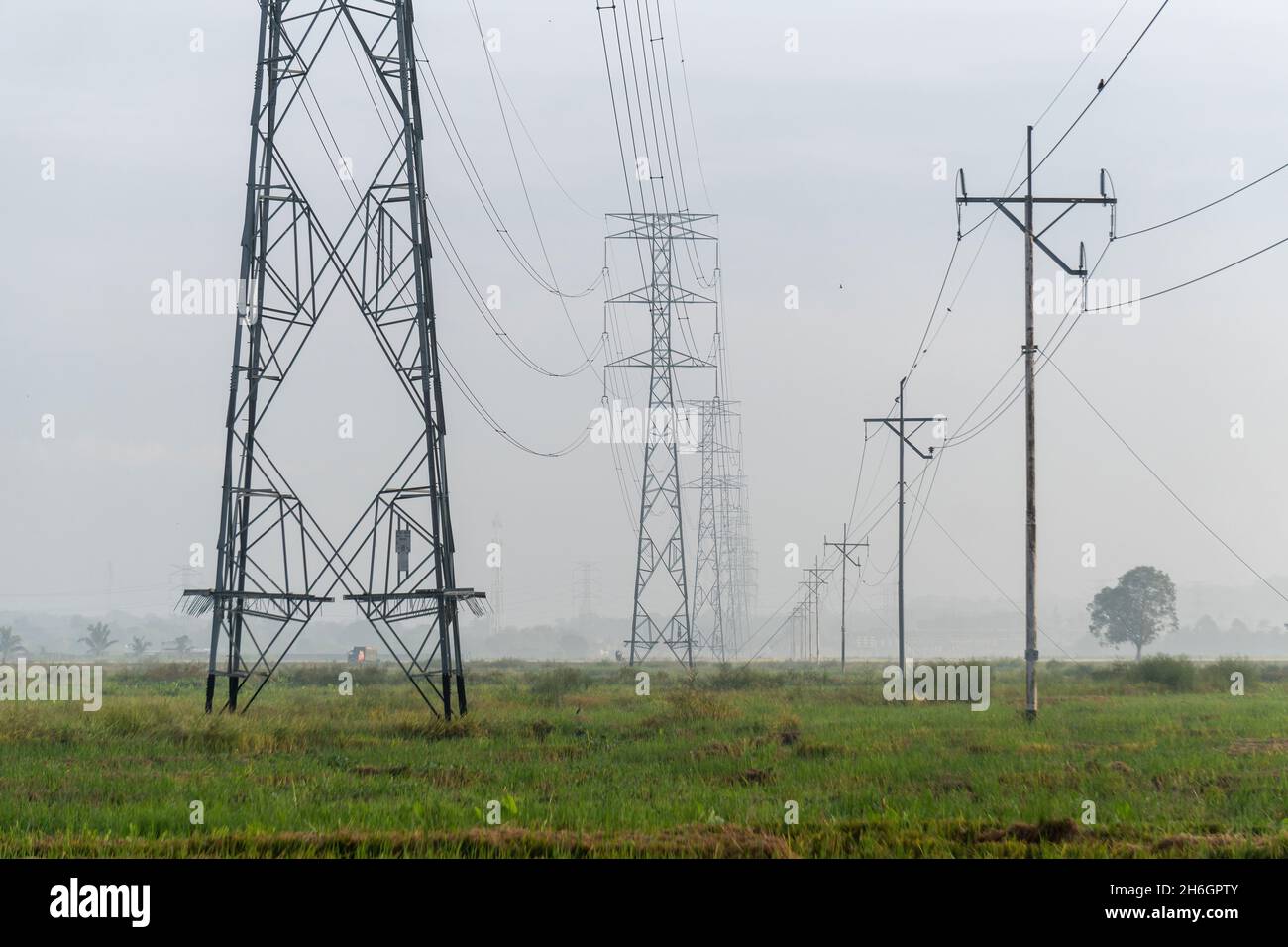 Landscape with transmission towers and electricity wires Stock Photo ...
