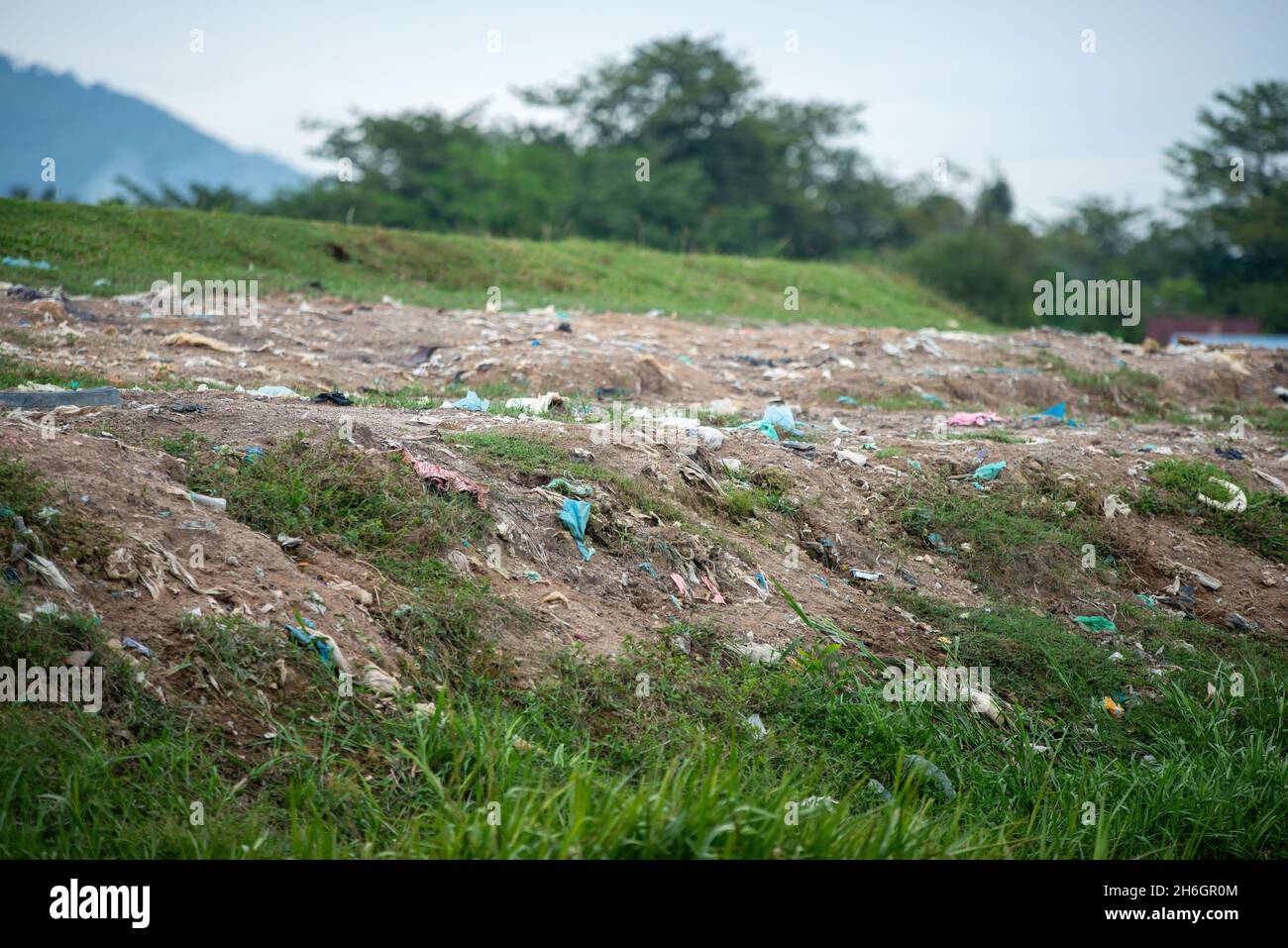 Landscape with plastic rubbish - environmental pollution concept Stock ...