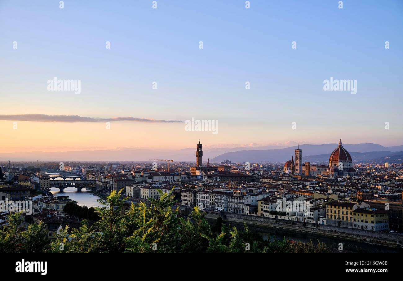 a view of the sunset in Firenze (Florence) from the high with the Arno ...
