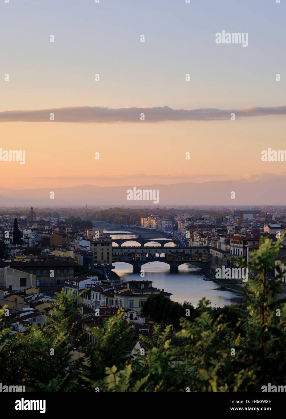 a view of the sunset in Firenze (Florence) from the high with the Arno ...