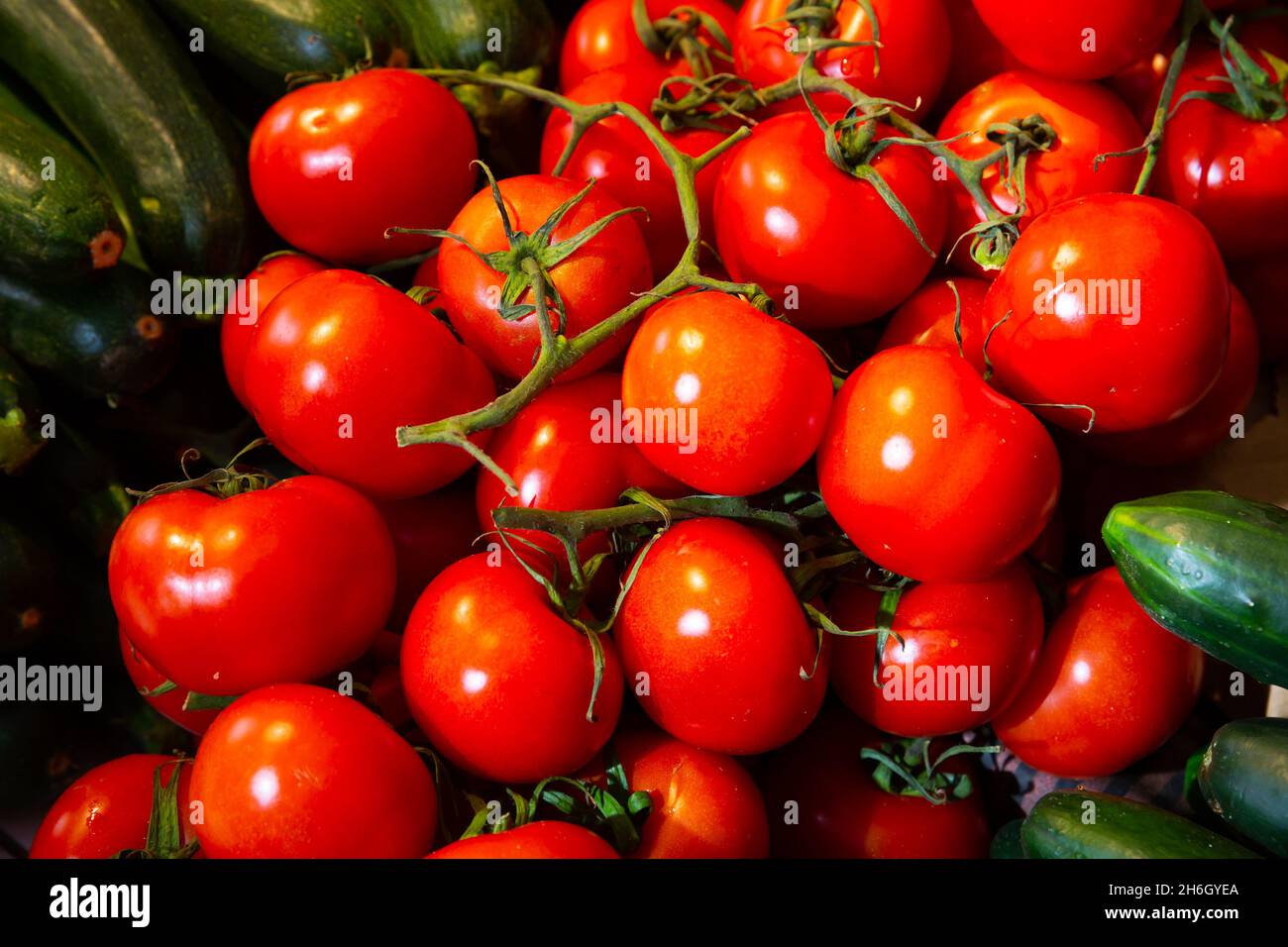 Boxes with tomatoes in store Stock Photo - Alamy