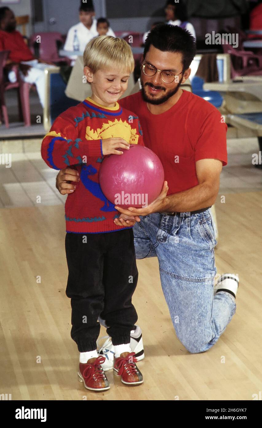 Child wearing bowling shoes hi-res stock photography and images - Alamy