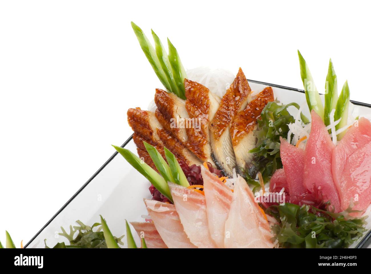 Set of Sashimi on Daikon with Seaweed, Cucumber Stock Photo - Alamy