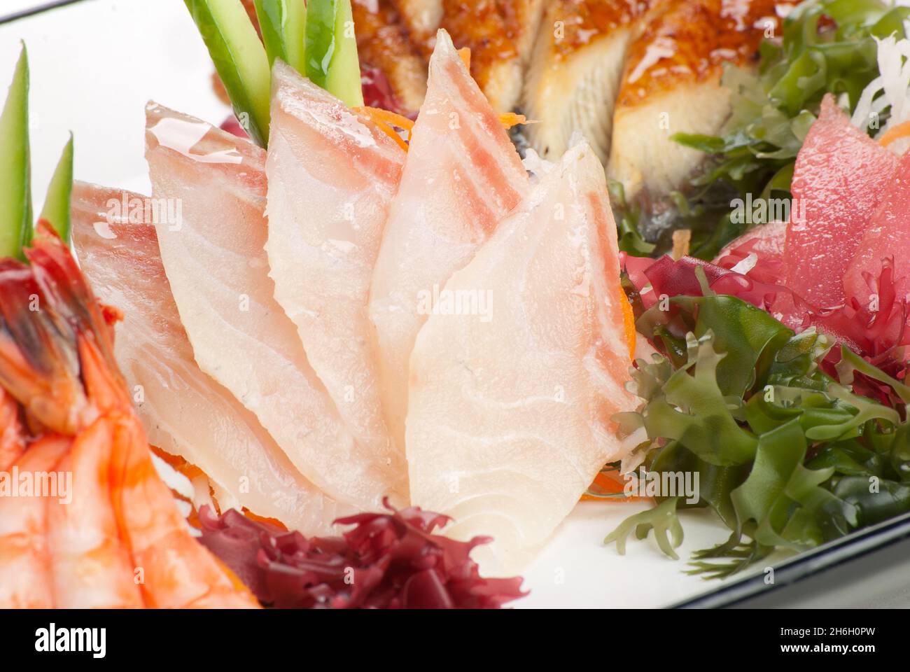 Set of Sashimi on Daikon with Seaweed, Cucumber Stock Photo - Alamy