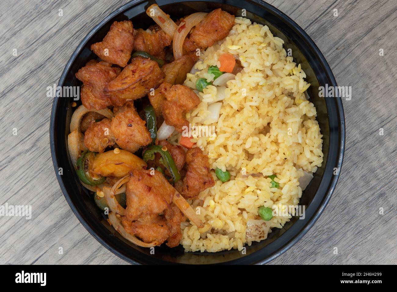 Overhead view of tradiional Chinese fast food meal with fried rice and ...
