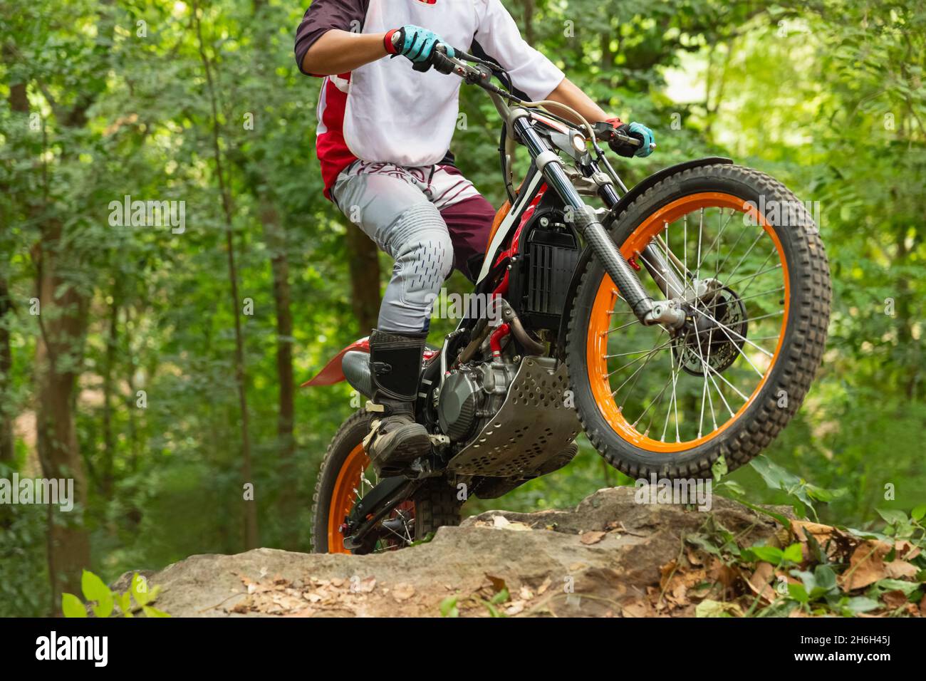Jumping over rocks hi-res stock photography and images - Alamy