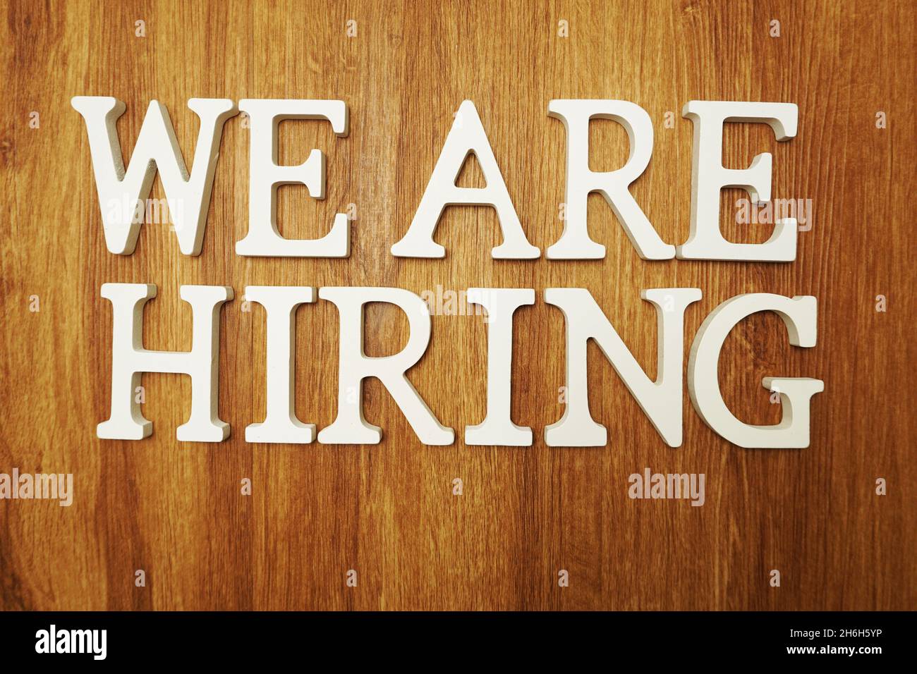 We are Hiring word alphabet letters on wooden background Stock Photo ...
